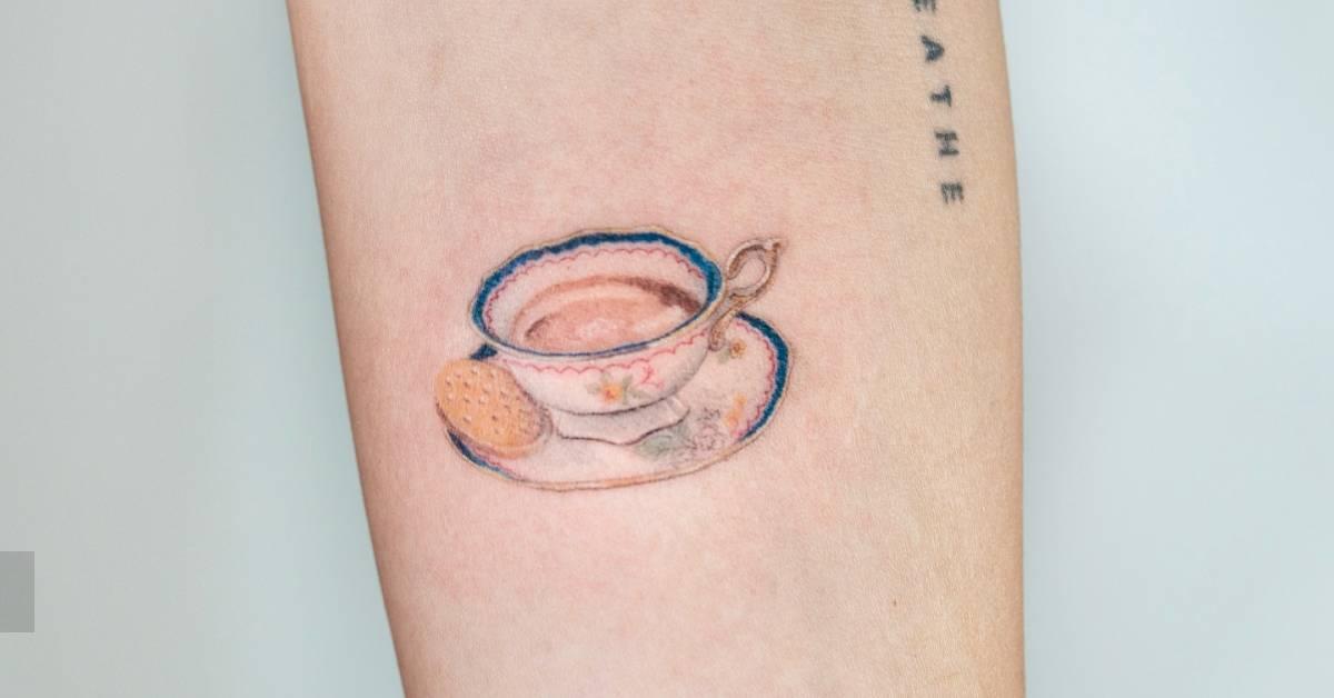 Tea and biscuit tattoo in watercolor style located on