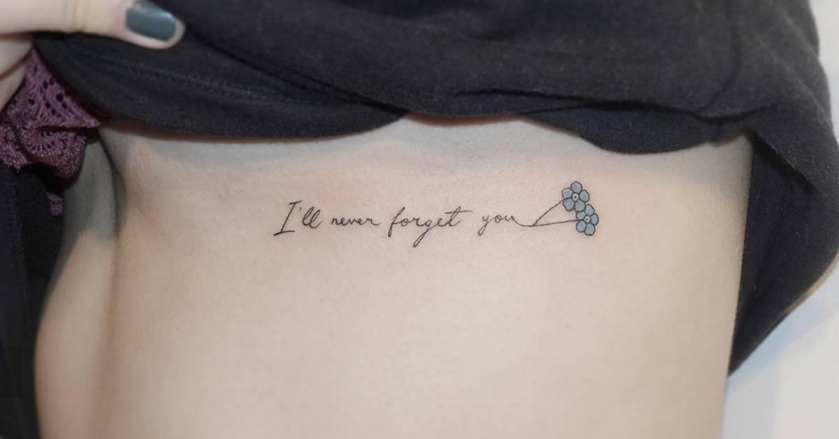 "I'll never forget you" lettering tattoo located on the