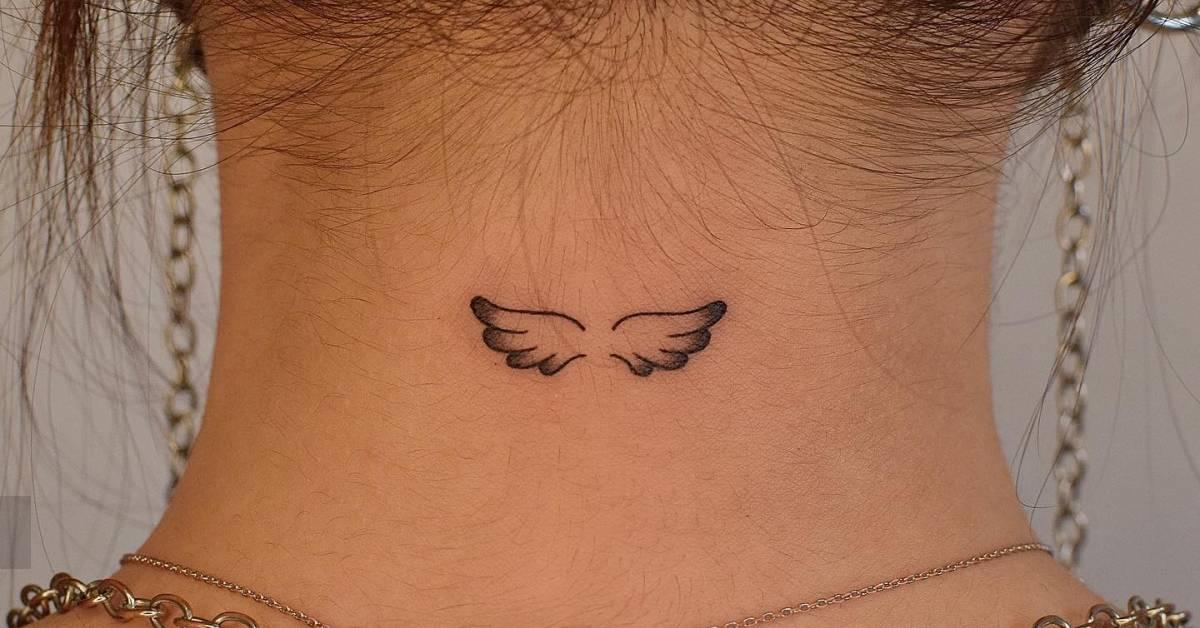 Angel wings tattoo located on the back of the neck,