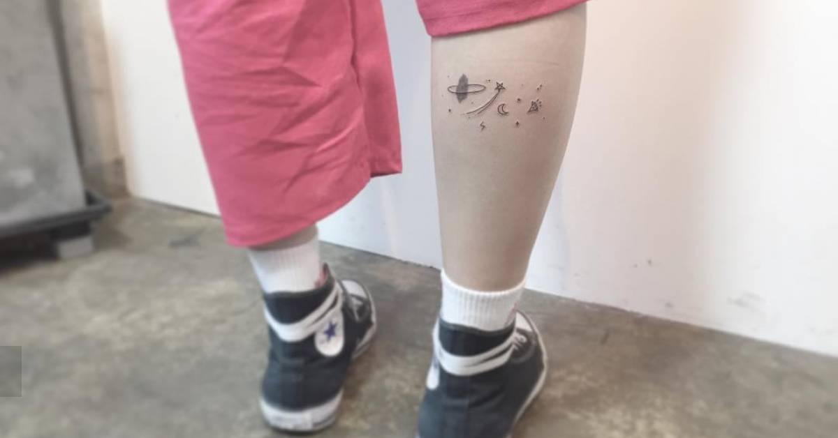 Mole cover-up tattoo located on the calf.