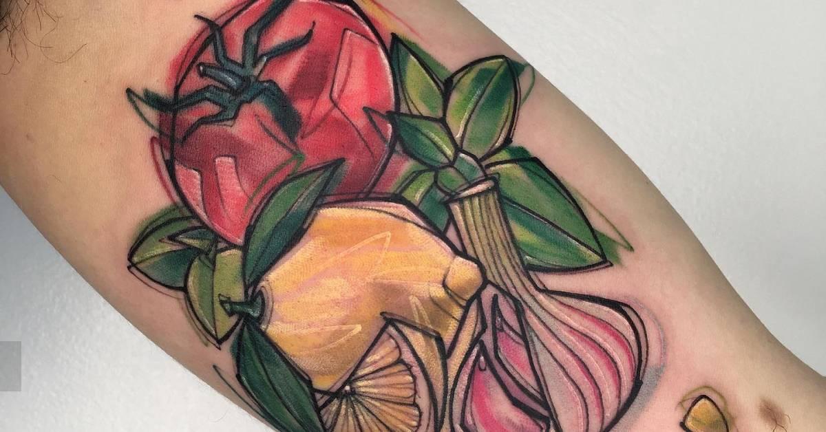 Tomato, lemon, basil and garlic tattoo located on the