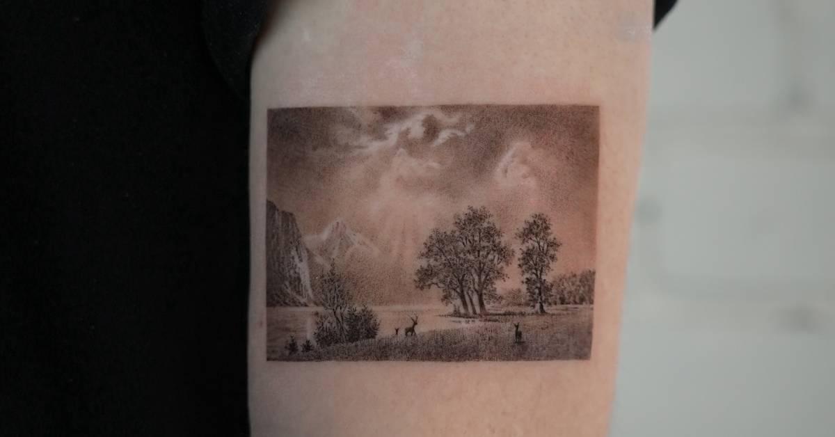Landscape tattoo in micro-realistic style placed on the