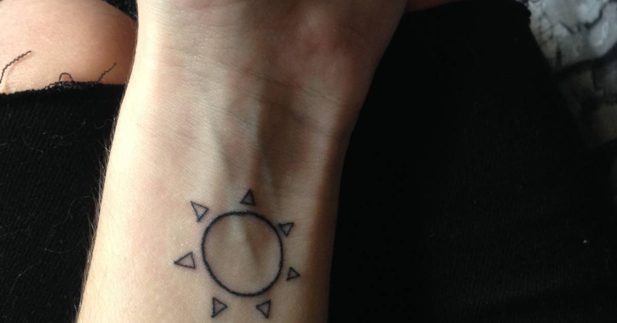 Sun tattoo on Sophia's left wrist: "The sun evokes