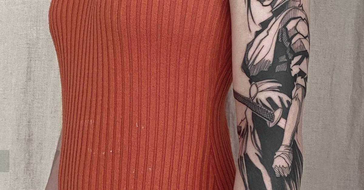 Onna-bugeisha tattoo in blackwork style located on the