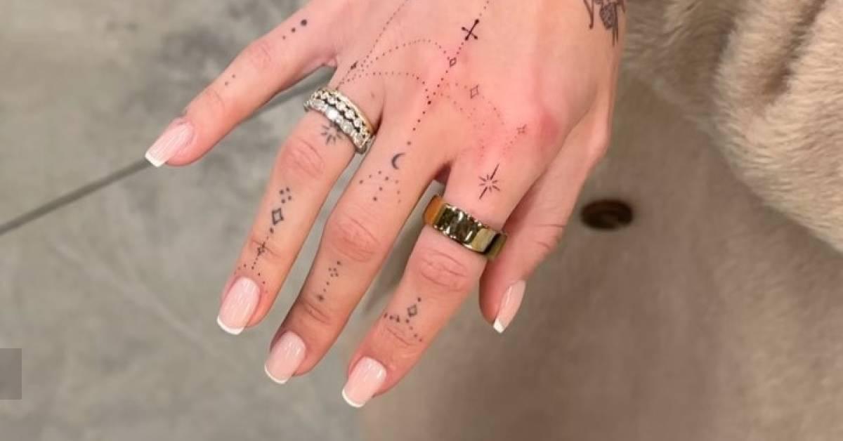 Fine line style hand composition ornamental tattoos.