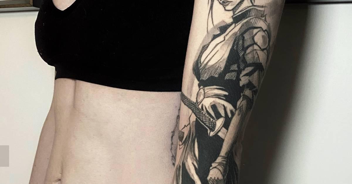 Onna-bugeisha tattoo in blackwork style located on the