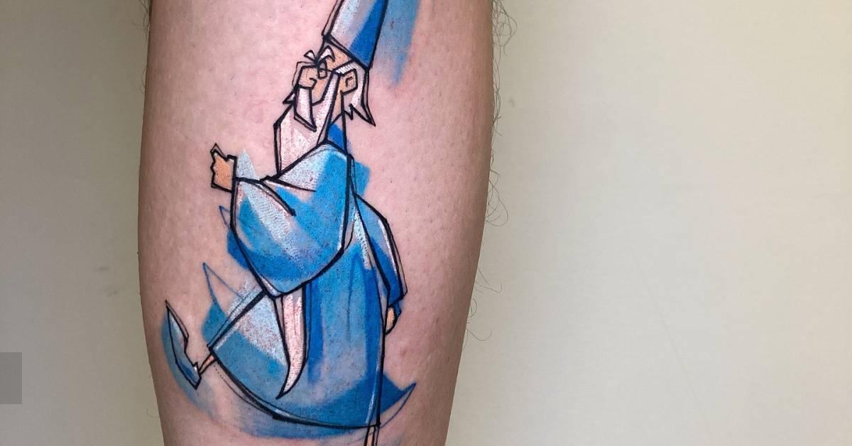 Sketch work style Merlin tattoo located on the calf.