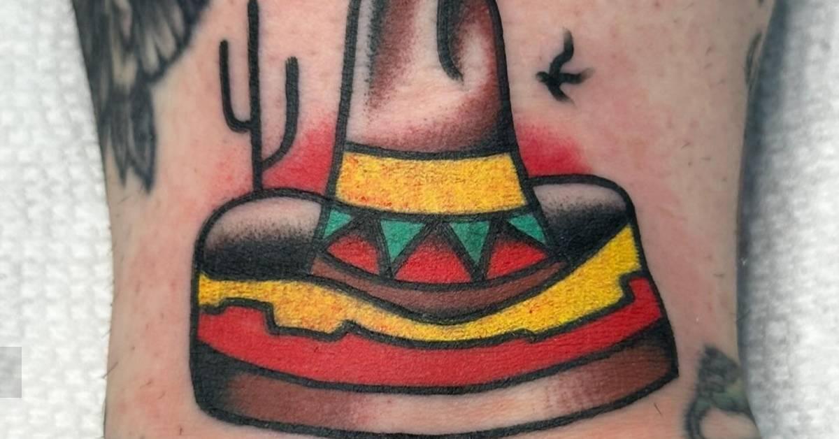 Traditional style sombrero tattoo located on the ankle.
