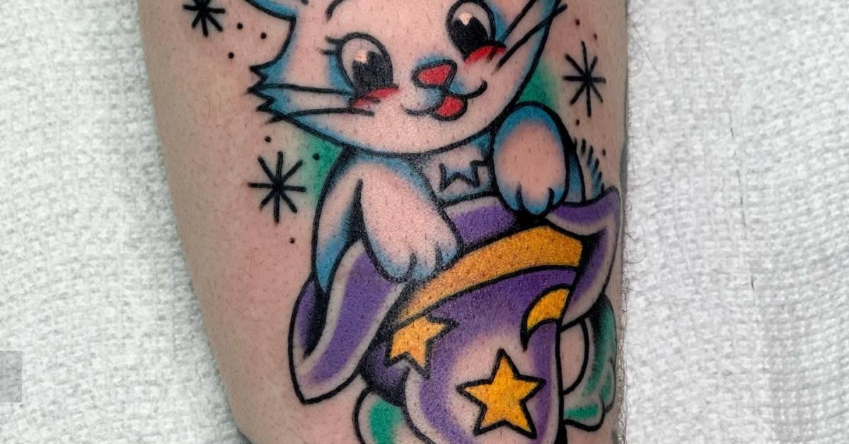 Magic rabbit tattoo located on the forearm, done in