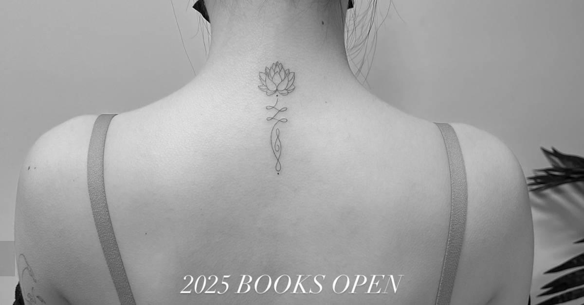 Fine line style lotus unalome tattoo placed on the