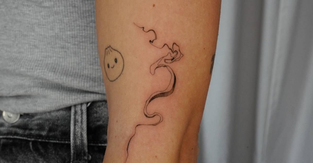 Smoke tattoo in illustrative style located on the upper