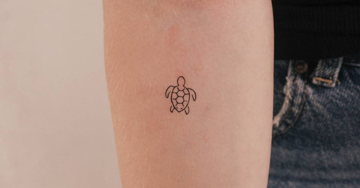 Little minimalistic turtle temporary tattoo placed on