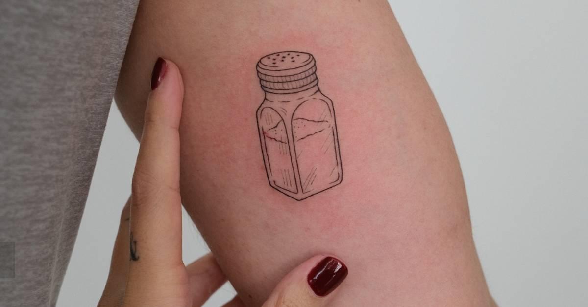 Salt shaker tattoo placed on the inner arm, done in