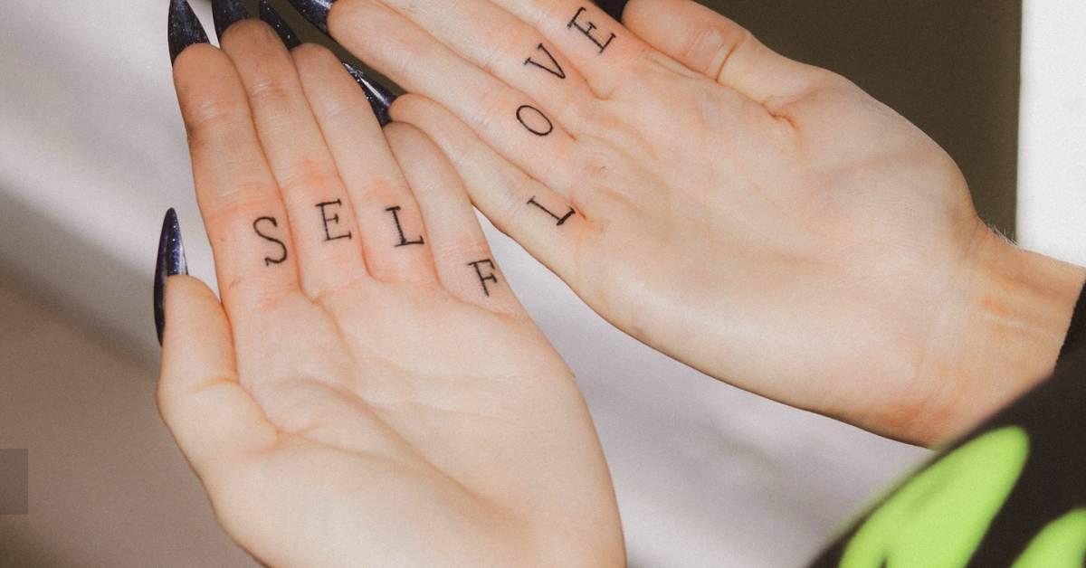 "Self love" individual matching lettering tattoo