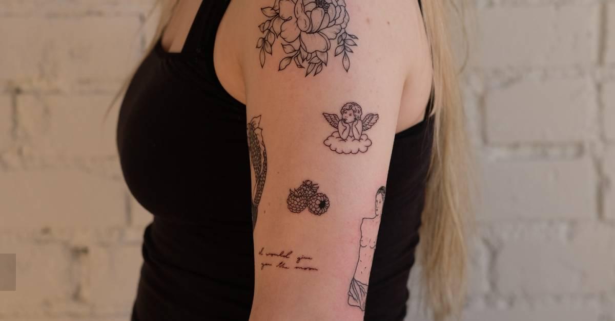 Arm composition tattoos in illustrative style.