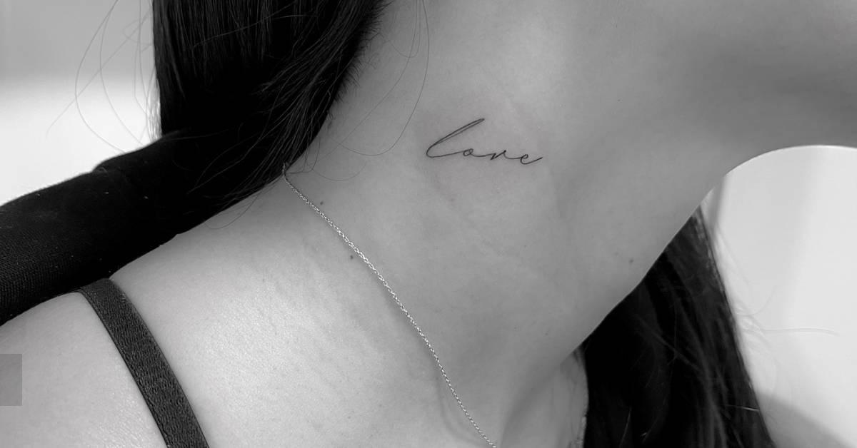 Lettering tattoo of the word "love" located on the