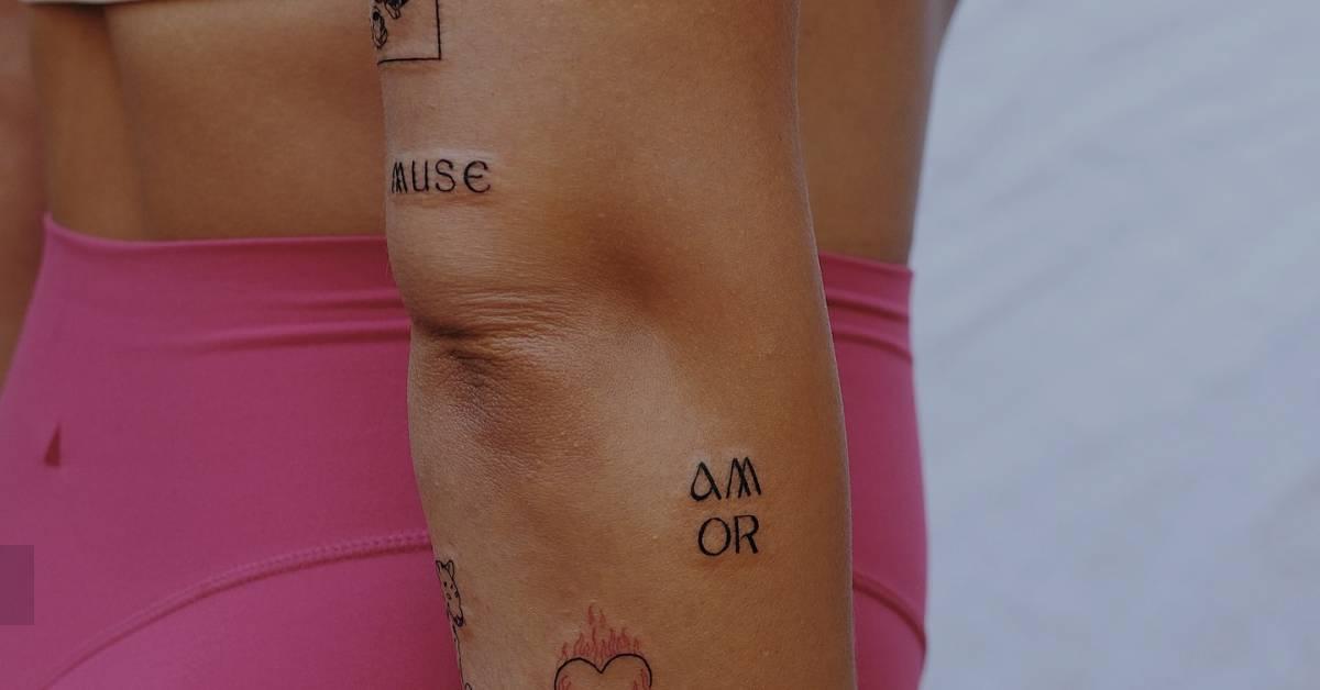 Arm composition tattoos.