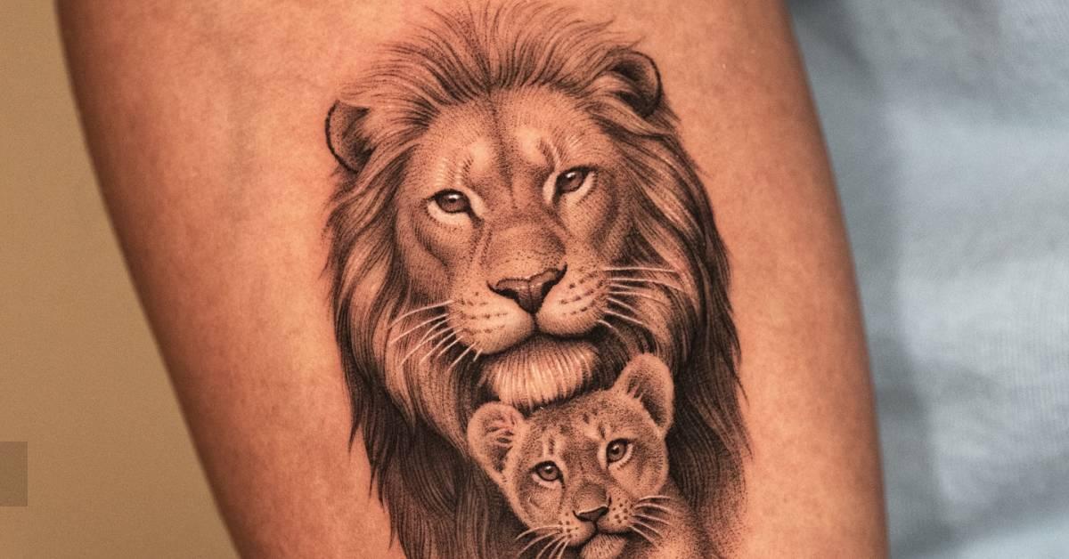 Lion and cub portrait tattoo in micro-realistic style.