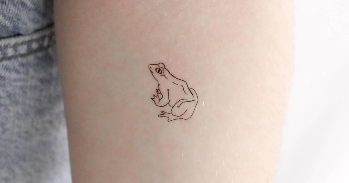 Fine line style frog temporary tattoo done on the inner