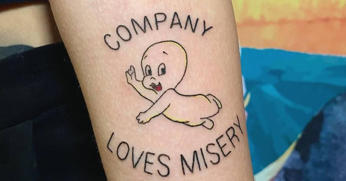 Casper and "company loves misery" tattooed on the inner