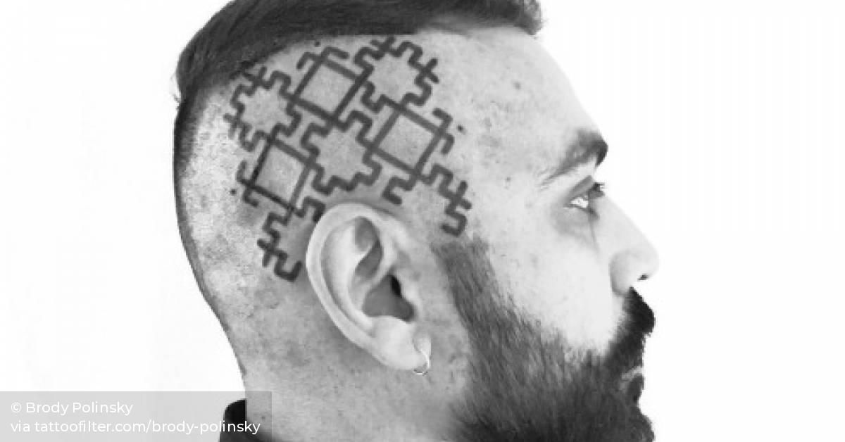 Custom pattern tattoo on Zair's head.