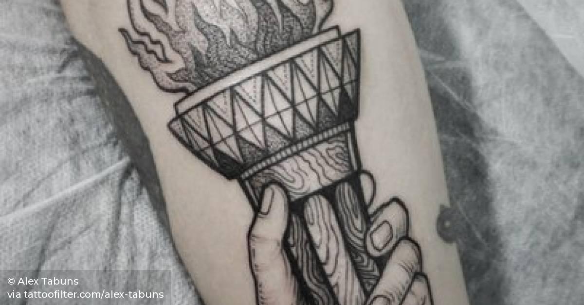 Blackwork illustrative style torch tattoo on the left