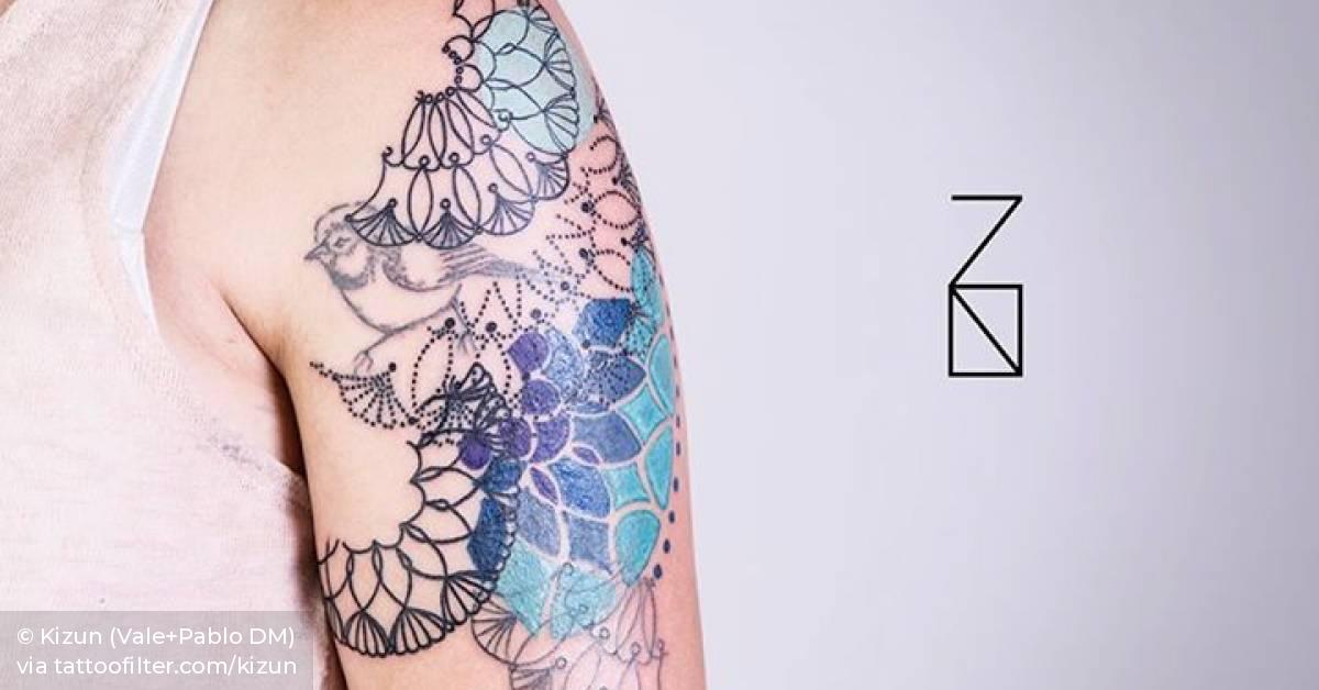 Graphic style ornamental composition tattoo on the left
