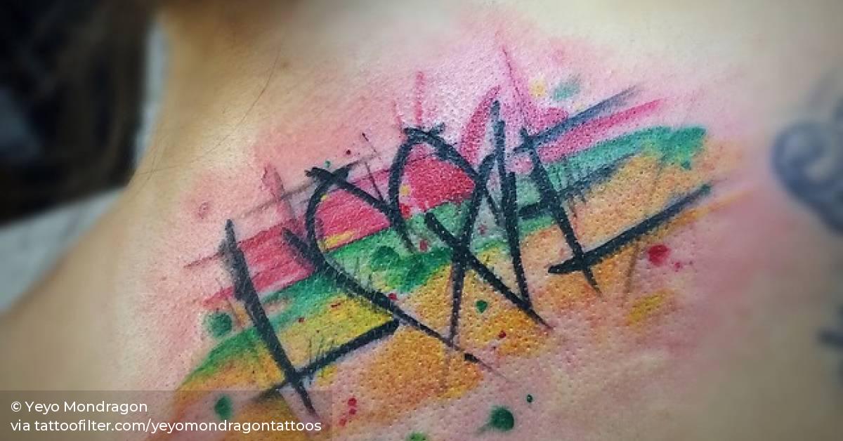 "Love" tattoo on the upper back.