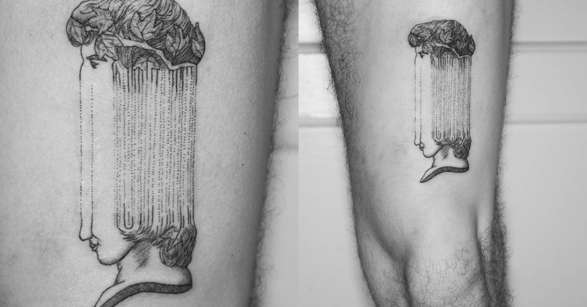 Surrealist fine line tattoo on the left thigh.