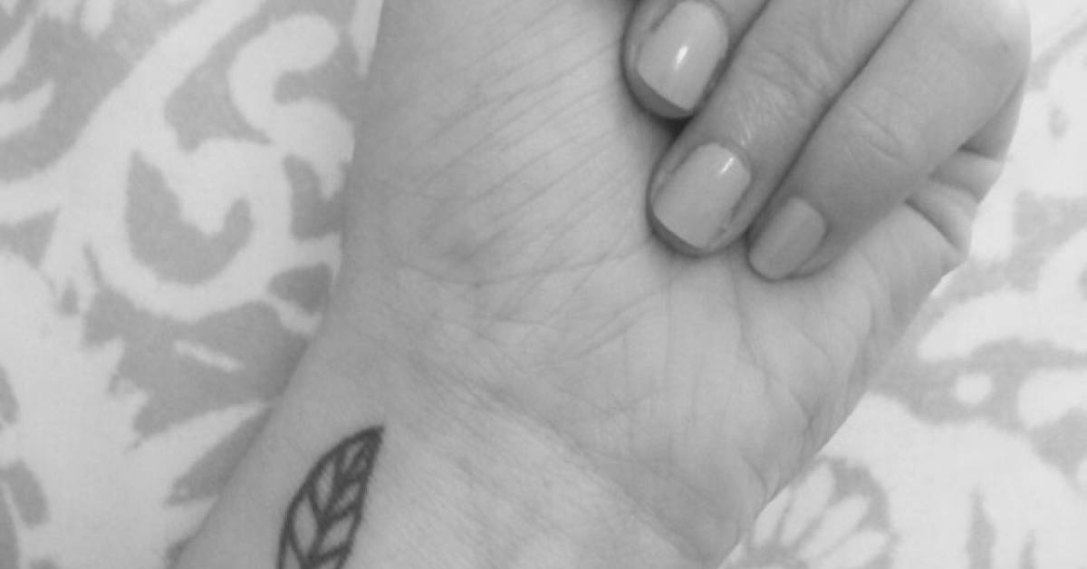 Wrist tattoo of a leaf on Jessica.