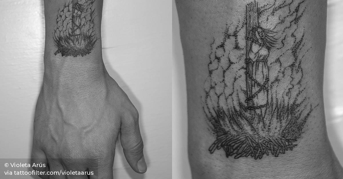 Death by burning tattoo on the wrist.