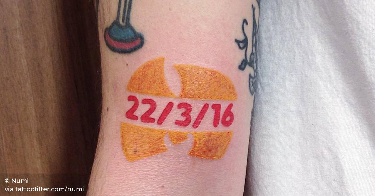 Wu-Tang Clan inspired tattoo on the right bicep.
