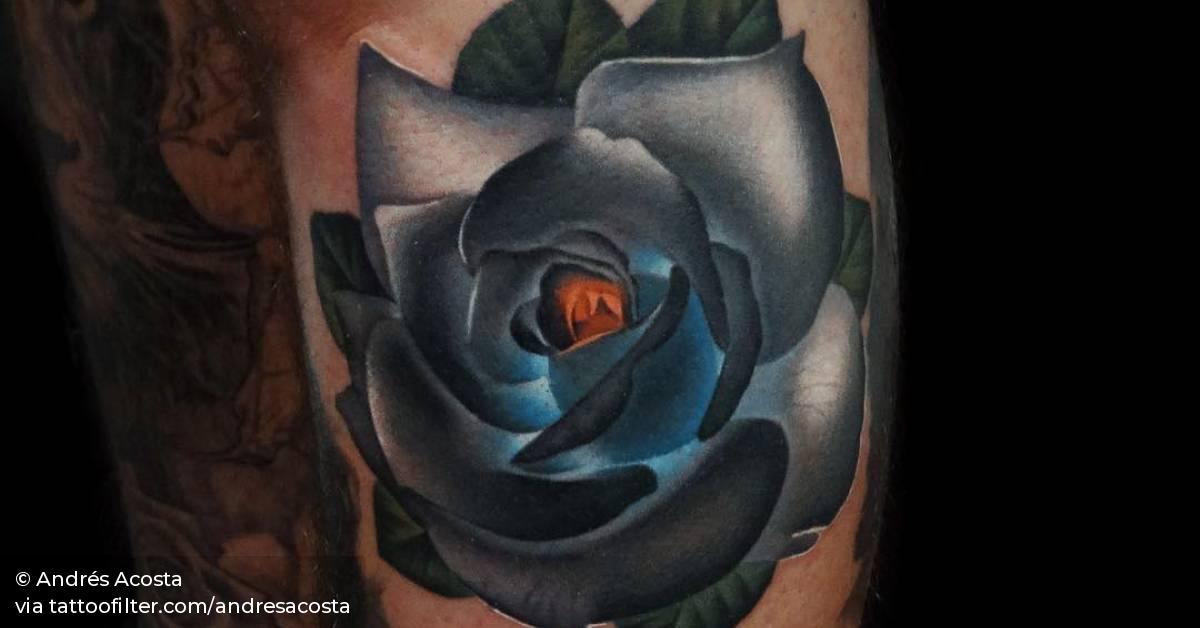 Realistic grey rose tattoo on the left lower leg.