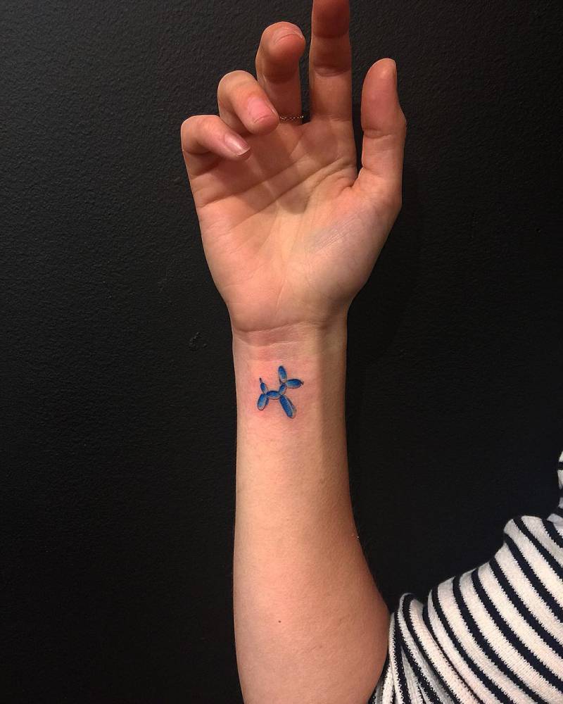 Jeff Koons Balloon Dog Tattoo On The Wrist Jeff Koons Balloon Dog Tattoo On The Wrist