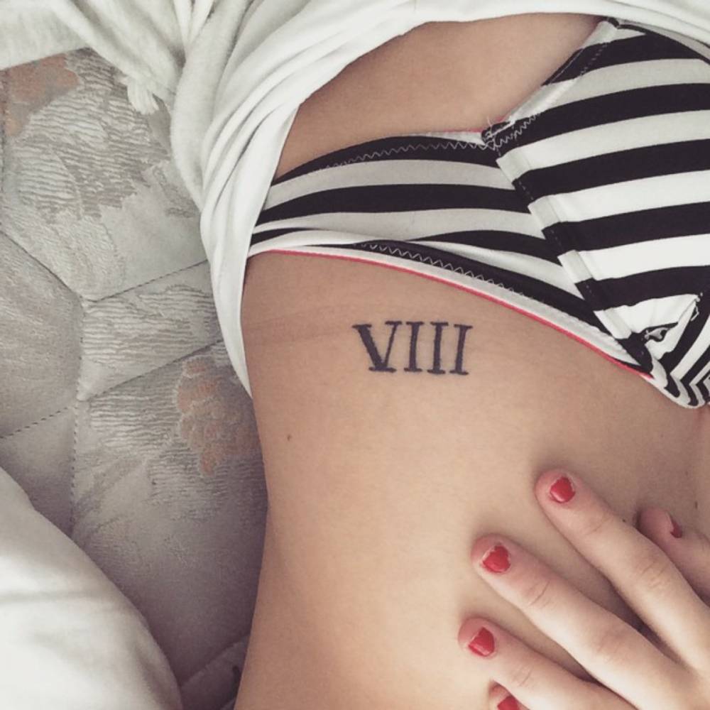 Side Tattoo Of The Number Eight In Roman Numerals Side Tattoo Of The Number Eight In Roman Numerals