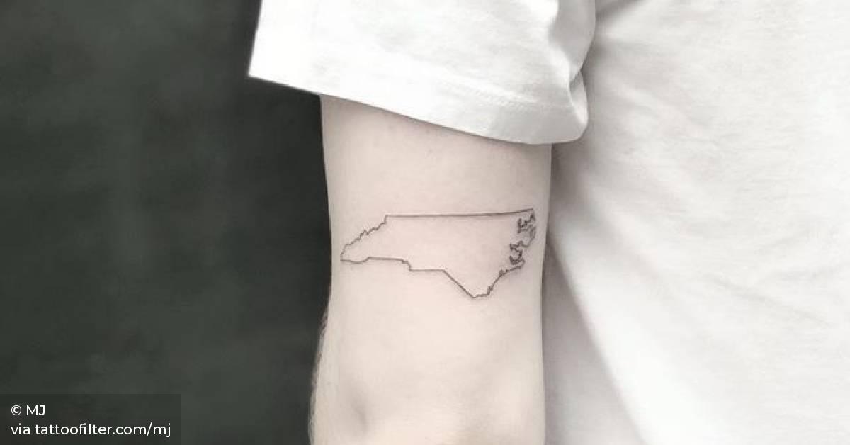 North Carolina map outline tattoo on the back of the