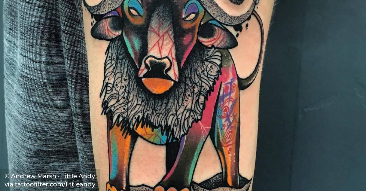 Psychedelic buffalo lion tattoo on the left thigh.