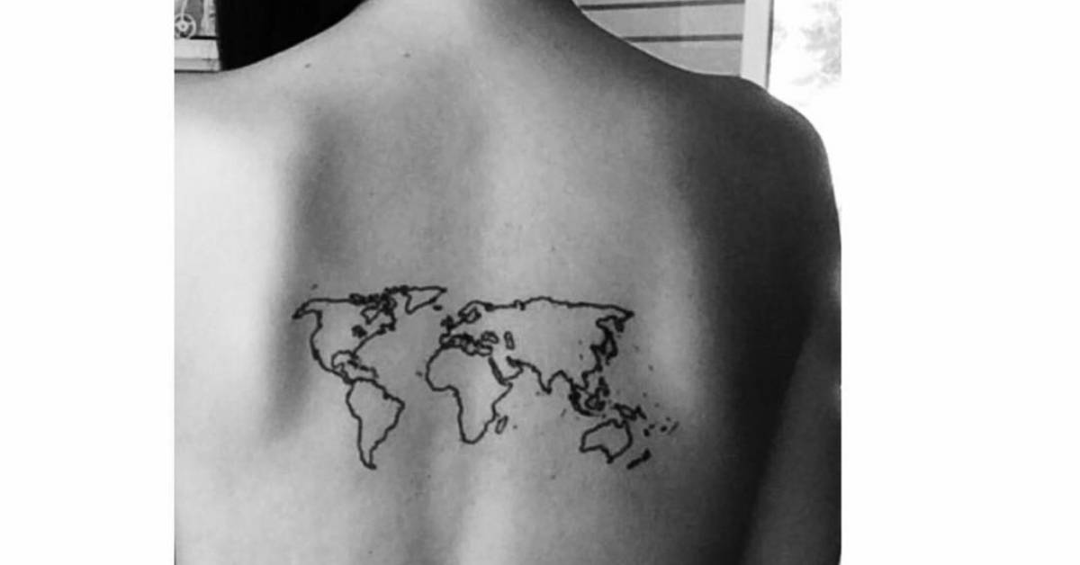 Back tattoo of the world map on Julia Maria del Carmen.