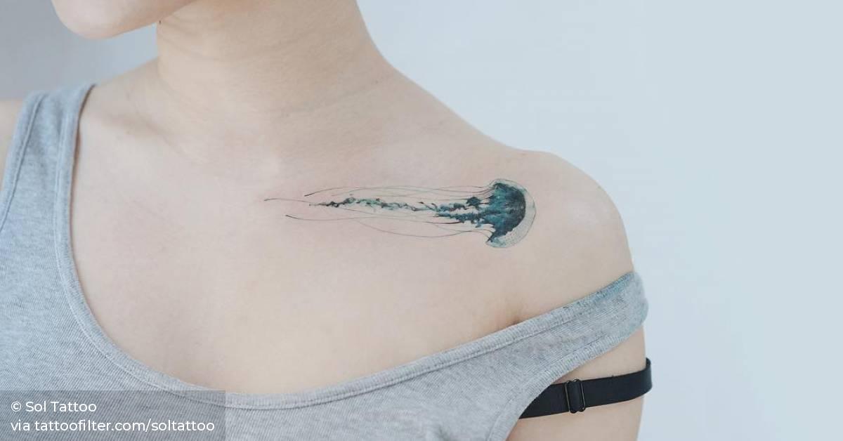 Jellyfish tattoo on the left collarbone.