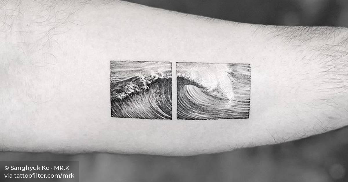 Wave tattoo on the inner forearm.
